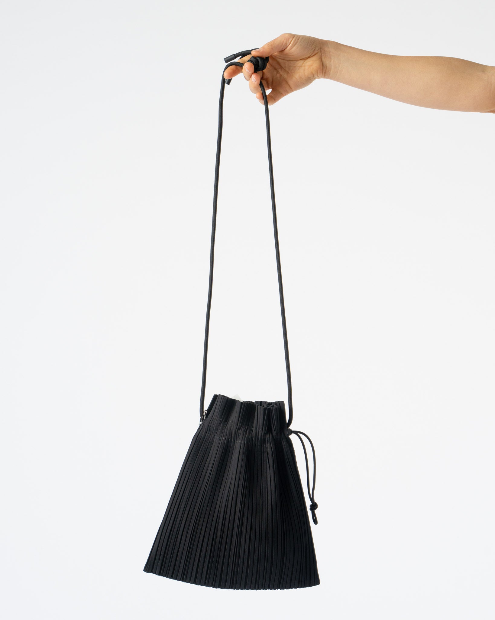 Pleats Please Issey Miyake Mini Pochette in Black Curated at Jake and Jones