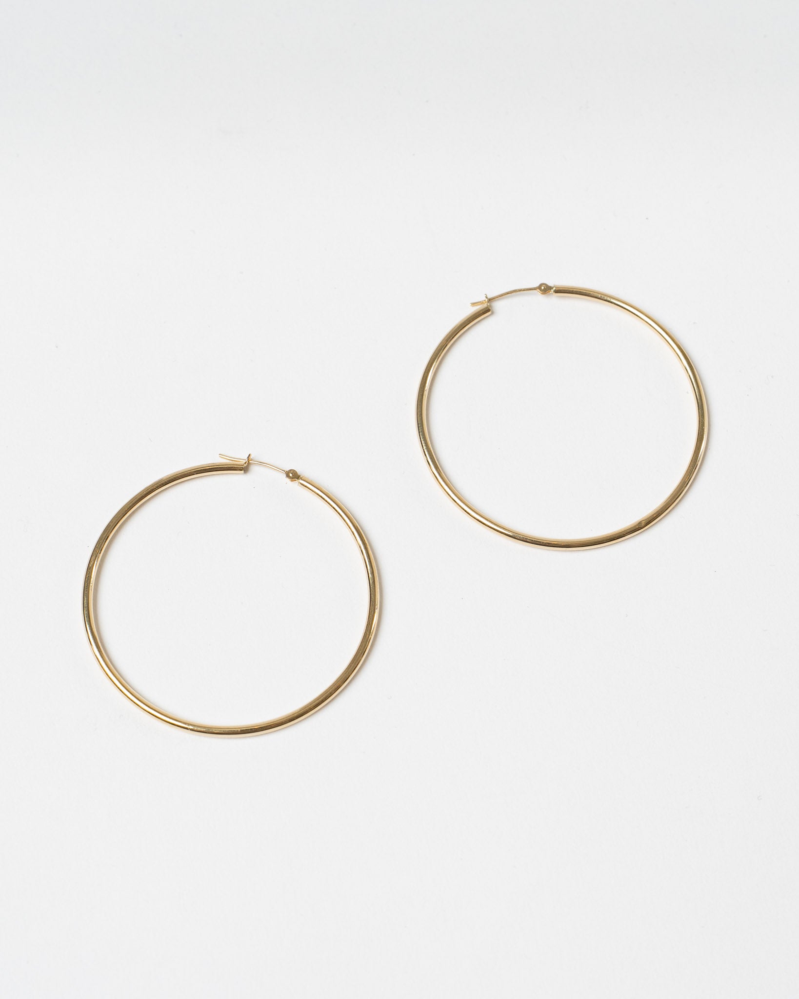 Takara 10K Hoops in Gold Curated at Jake and Jones