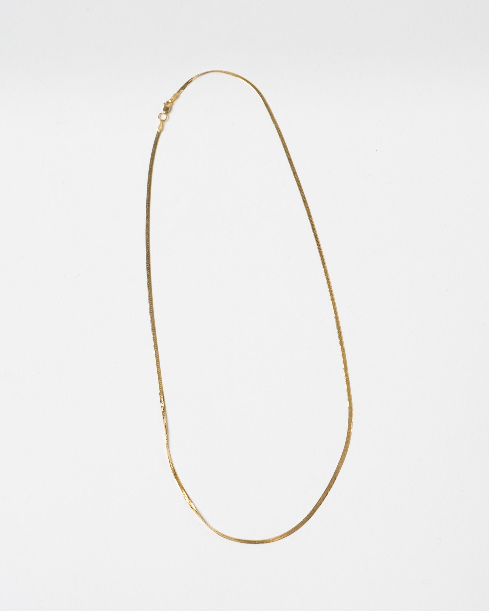 Takara 1.55mm 14k Gold Herringbone Chain Curated at Jake and Jones