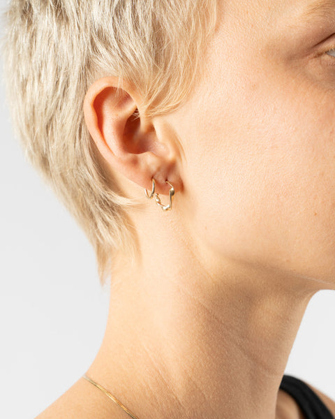 Takara Twisted Hoops in Gold Curated at Jake and Jones